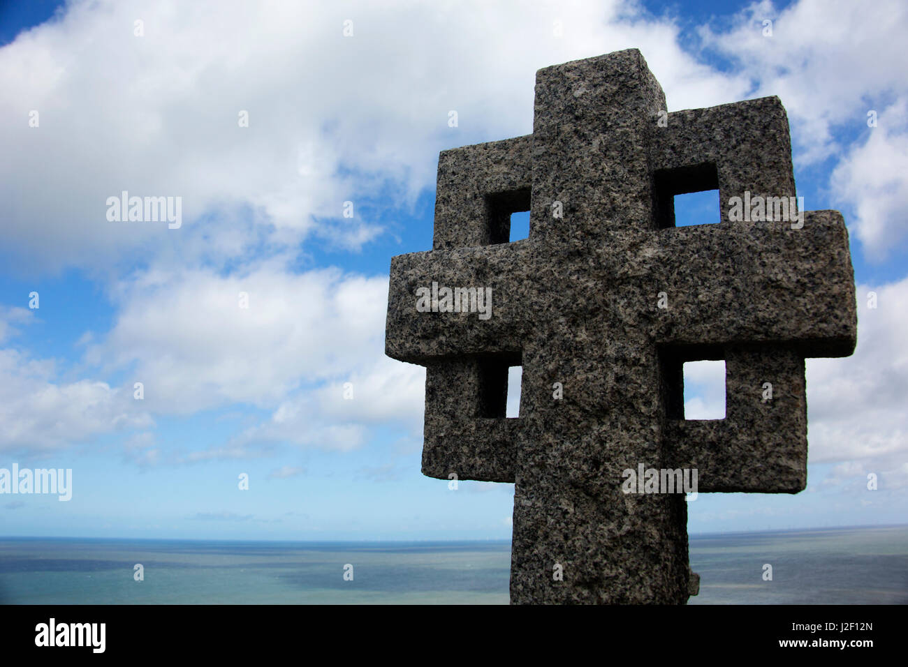 United Kingdom, Wales, Colwyn. Celtic cross at St. Tudno churchyard on ...