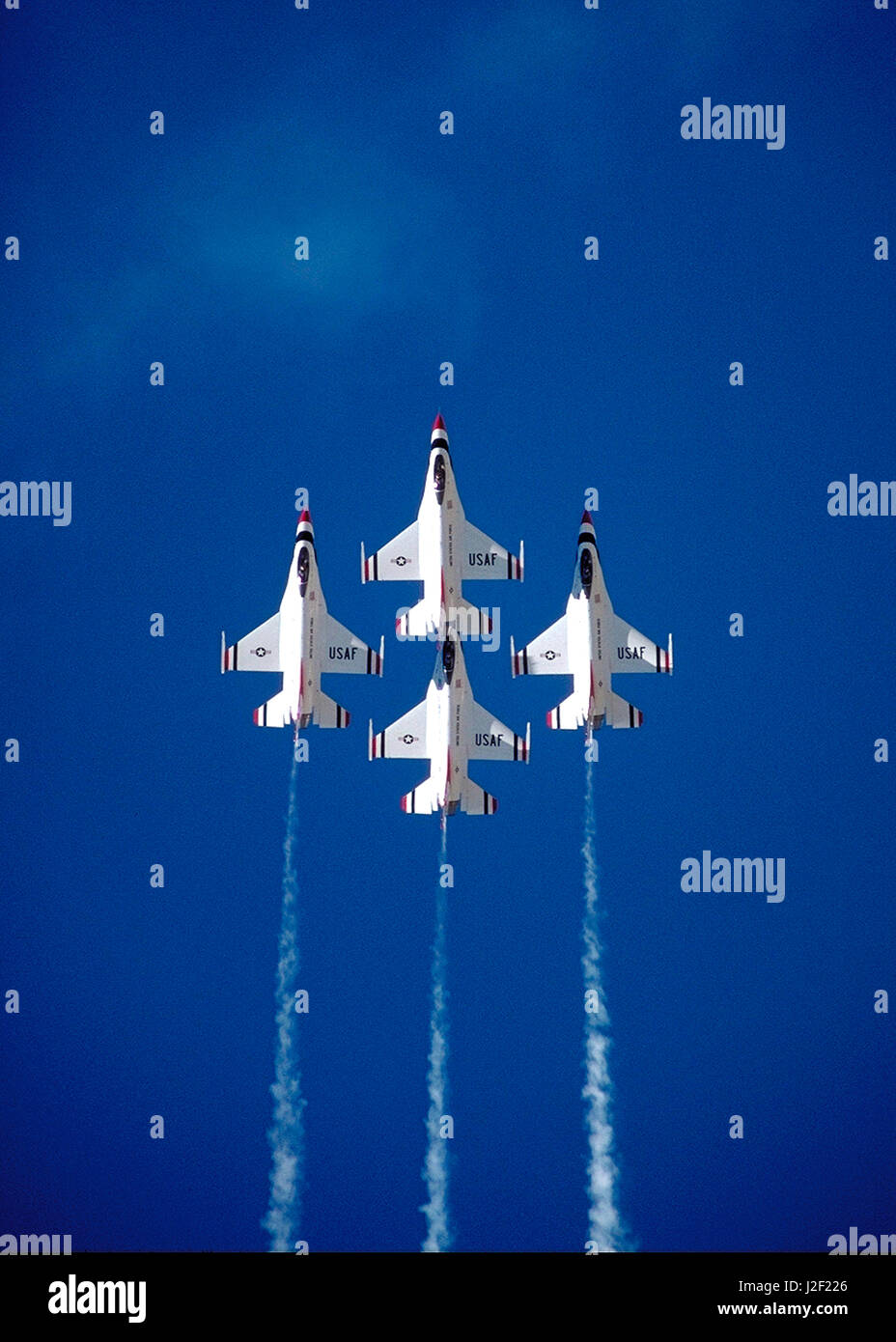 The US Air Force Thunderbirds climbing in a tight formation Stock Photo ...