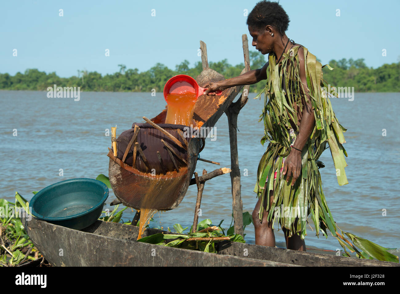 Melanesia, Papua New Guinea, Sepik River, village of Kopar. Woman in ...