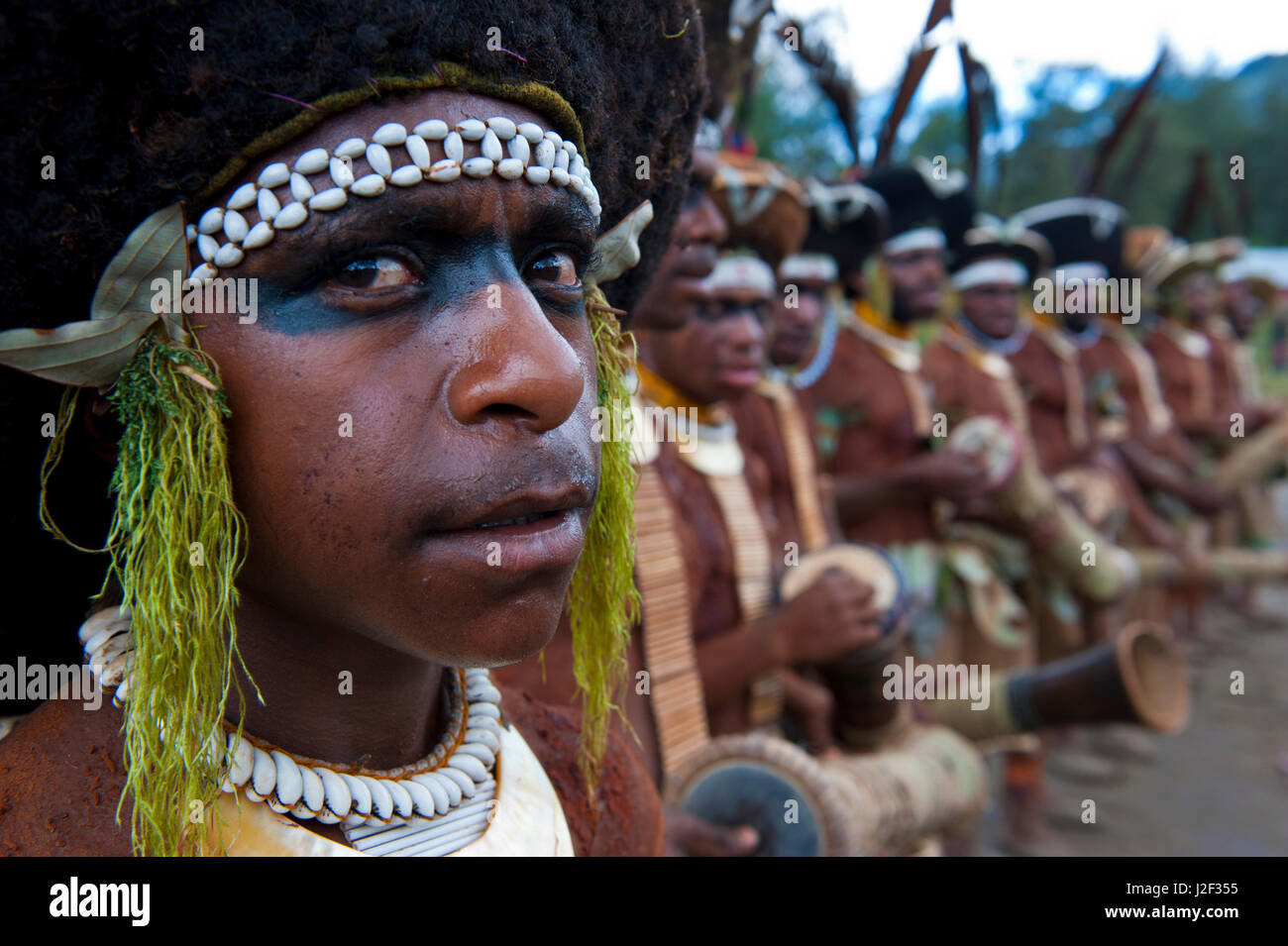Colorful dress and face painted local tribes celebrating the ...