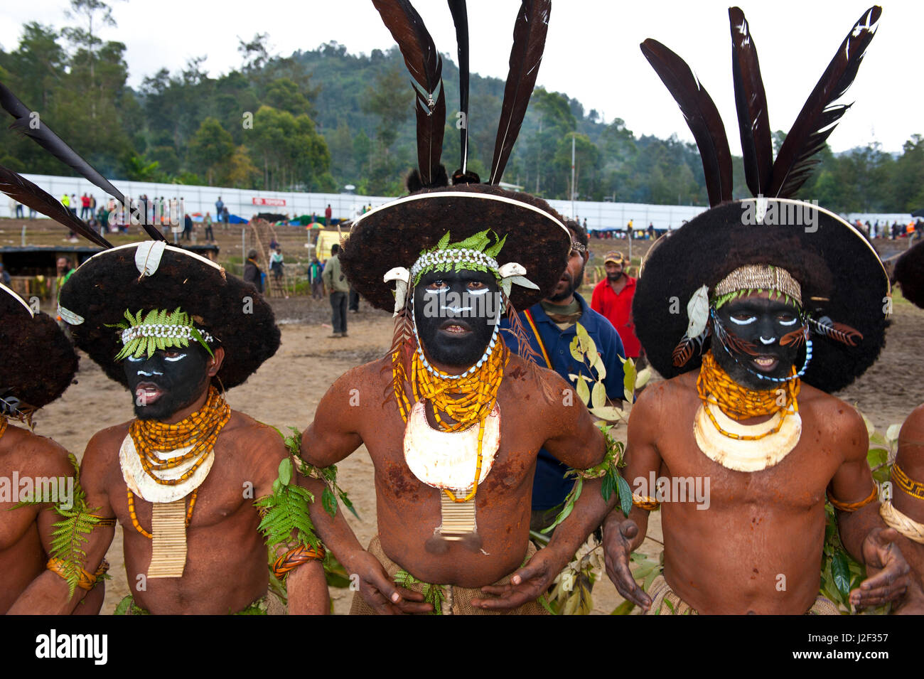Colorful dress and face painted local tribes celebrating the ...
