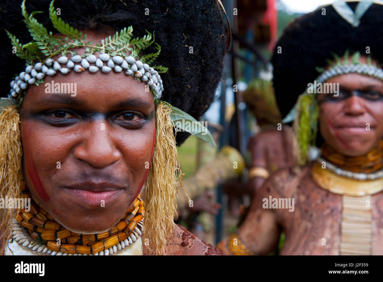 Colorful dress and face painted local tribes celebrating the ...