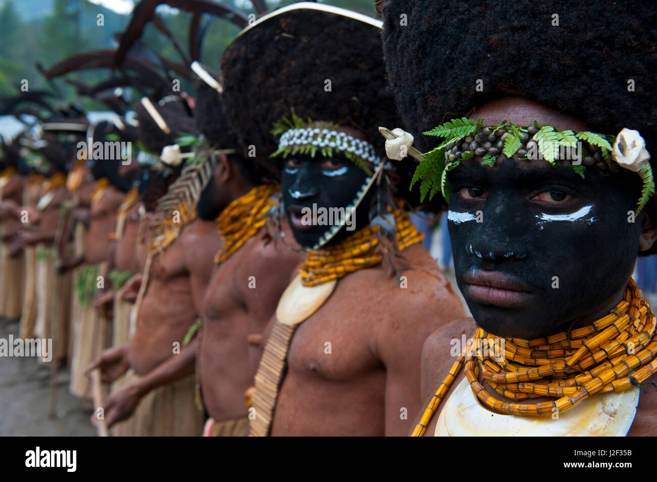 Colorful dress and face painted local tribes celebrating the ...