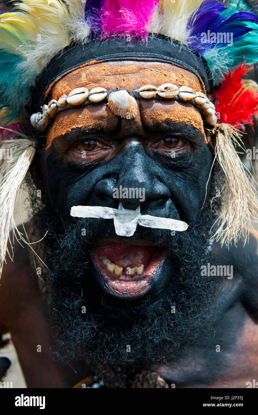 Colorful dress and face painted local tribes celebrating the ...