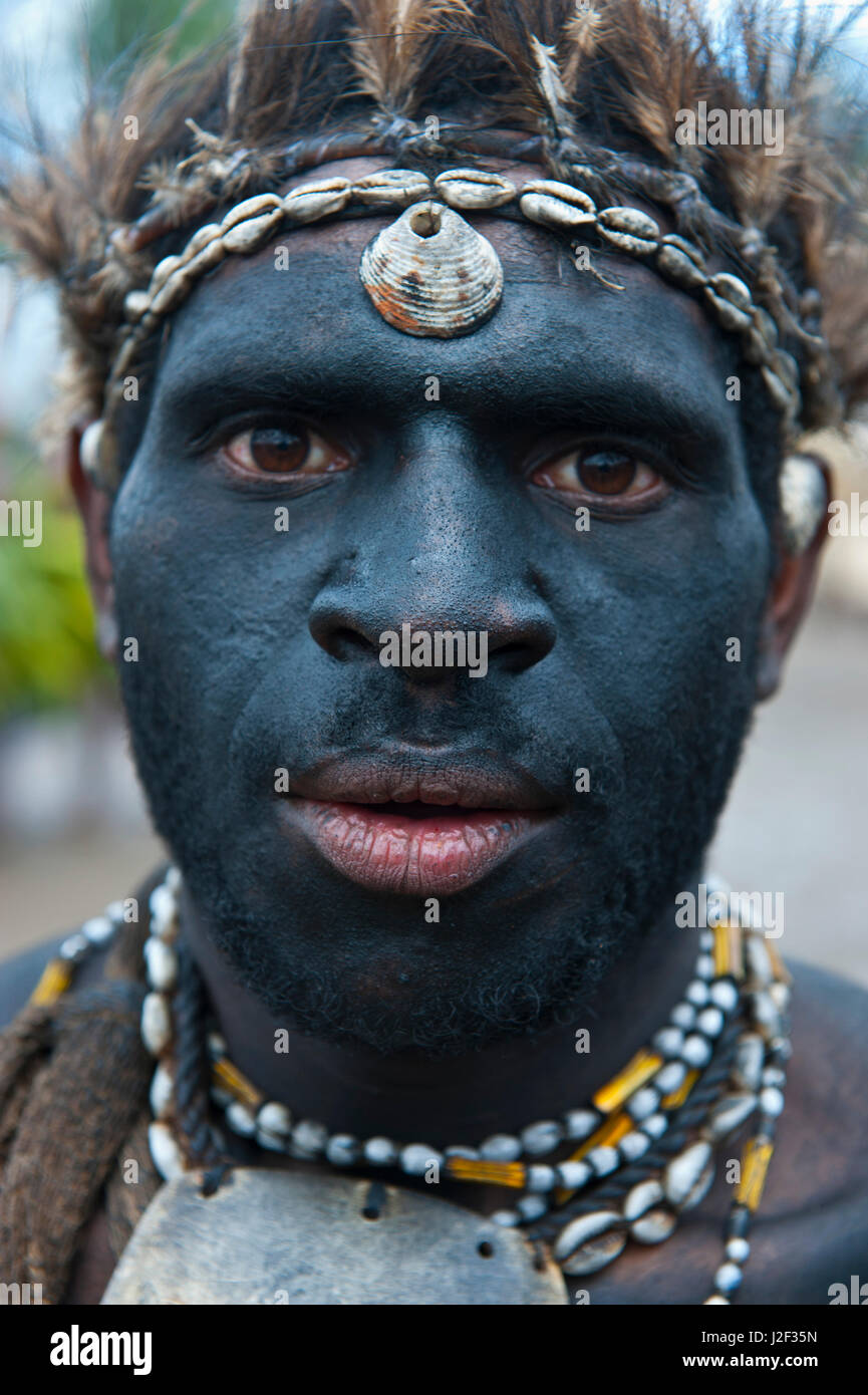 Colorful dress and face painted local tribes celebrating the ...