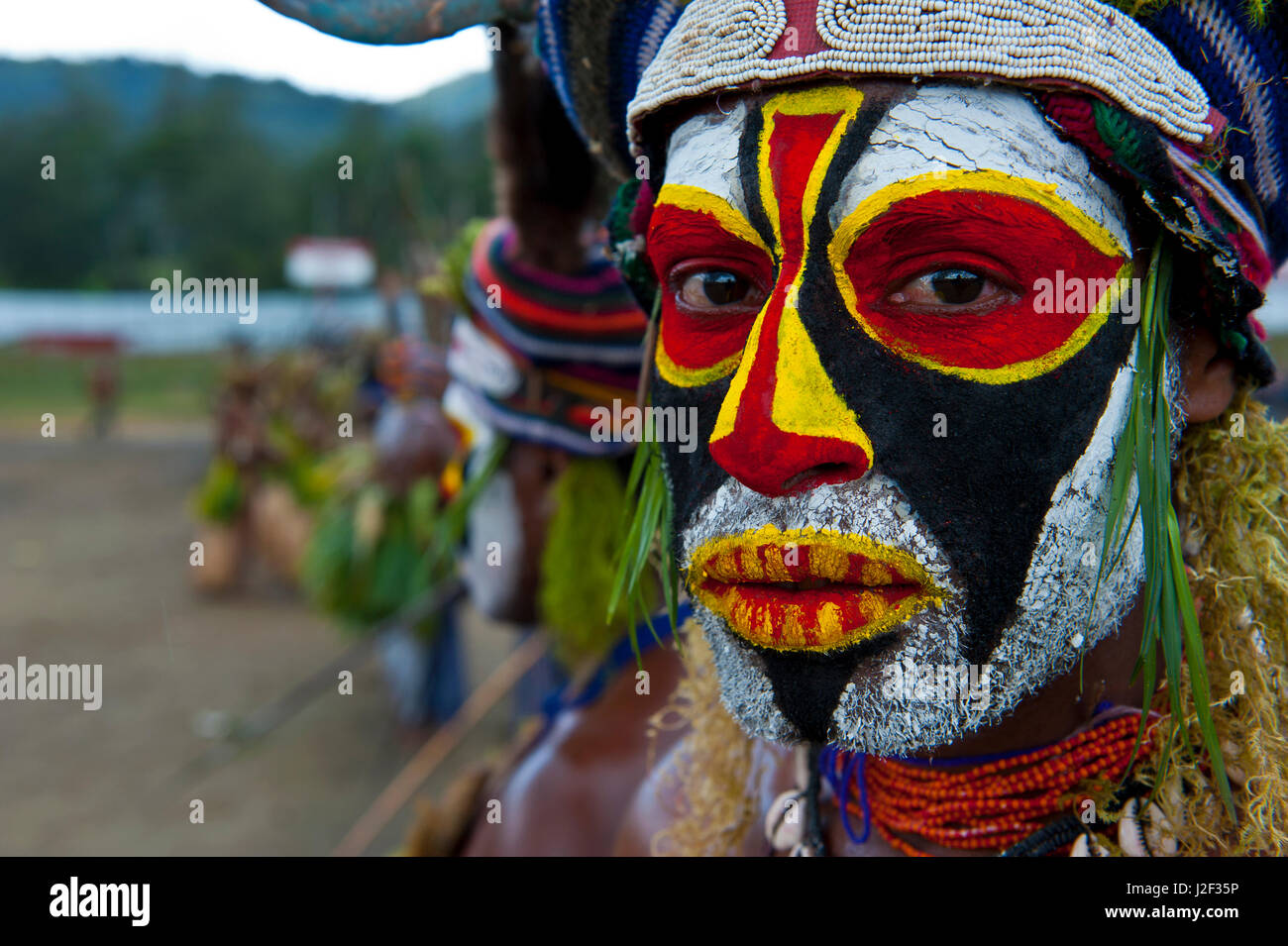 Colorful dress and face painted local tribes celebrating the ...