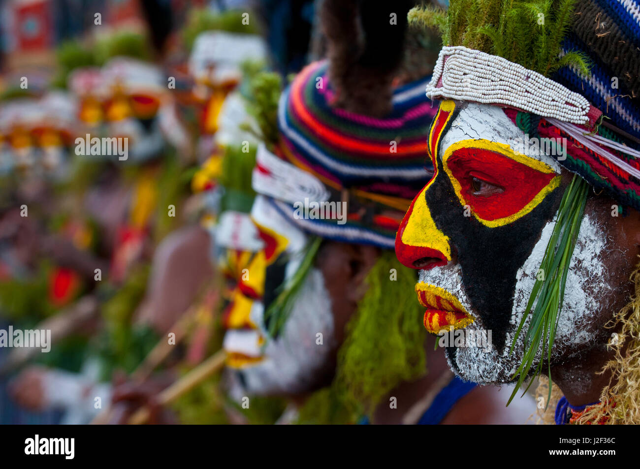 Colorful dress and face painted local tribes celebrating the ...