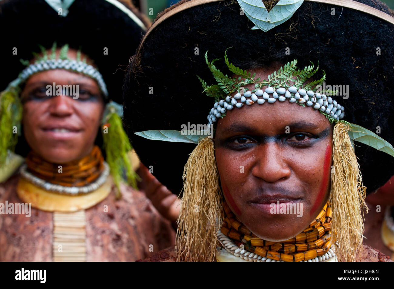 Colorful dress and face painted local tribes celebrating the ...