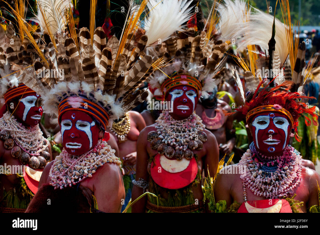 Colorful dress and face painted local tribes celebrating the ...