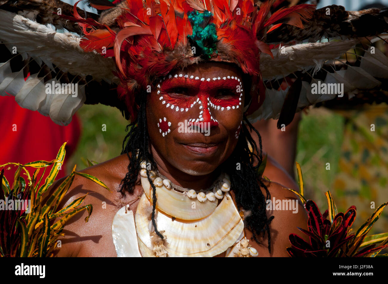 Colorful dress and face painted local tribes celebrating the ...