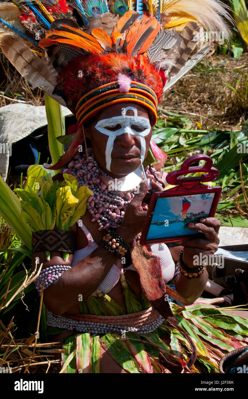 Colorful dress and face painted local tribes celebrating the ...