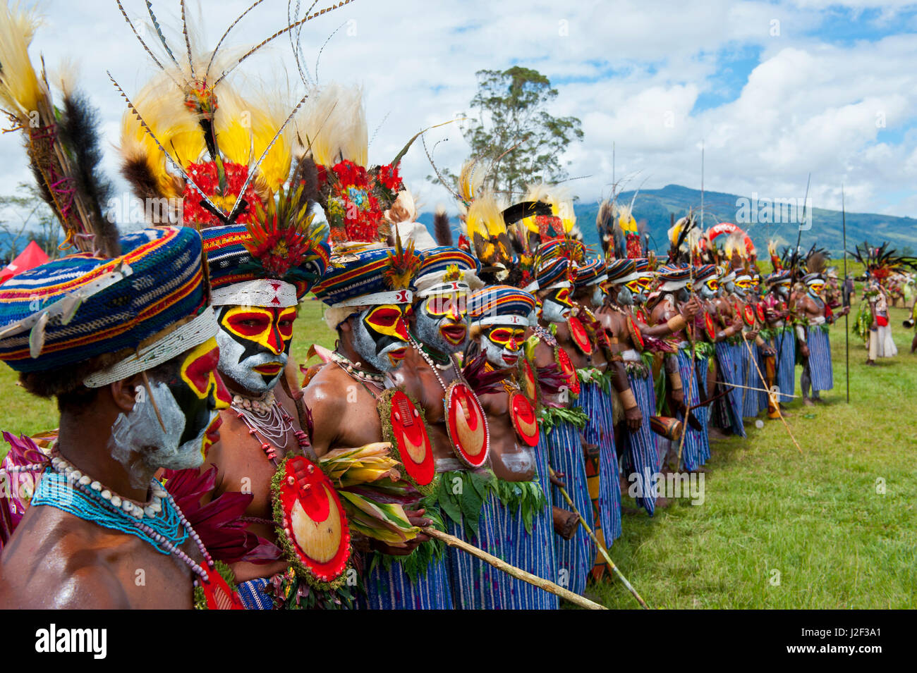 Colorful dress and face painted local tribes celebrating the ...