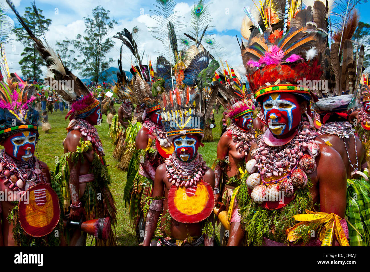 Colorful dress and face painted local tribes celebrating the ...