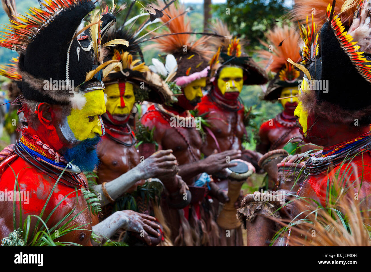 Colorful dress and face painted local tribes celebrating the ...