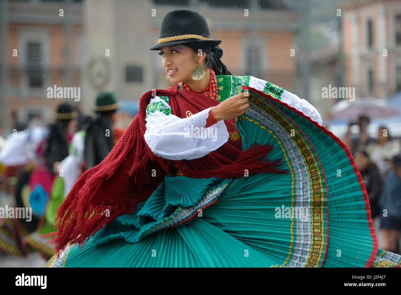 Ecuador, Pichincha, Quito. Women doing traditional dance while Quito ...