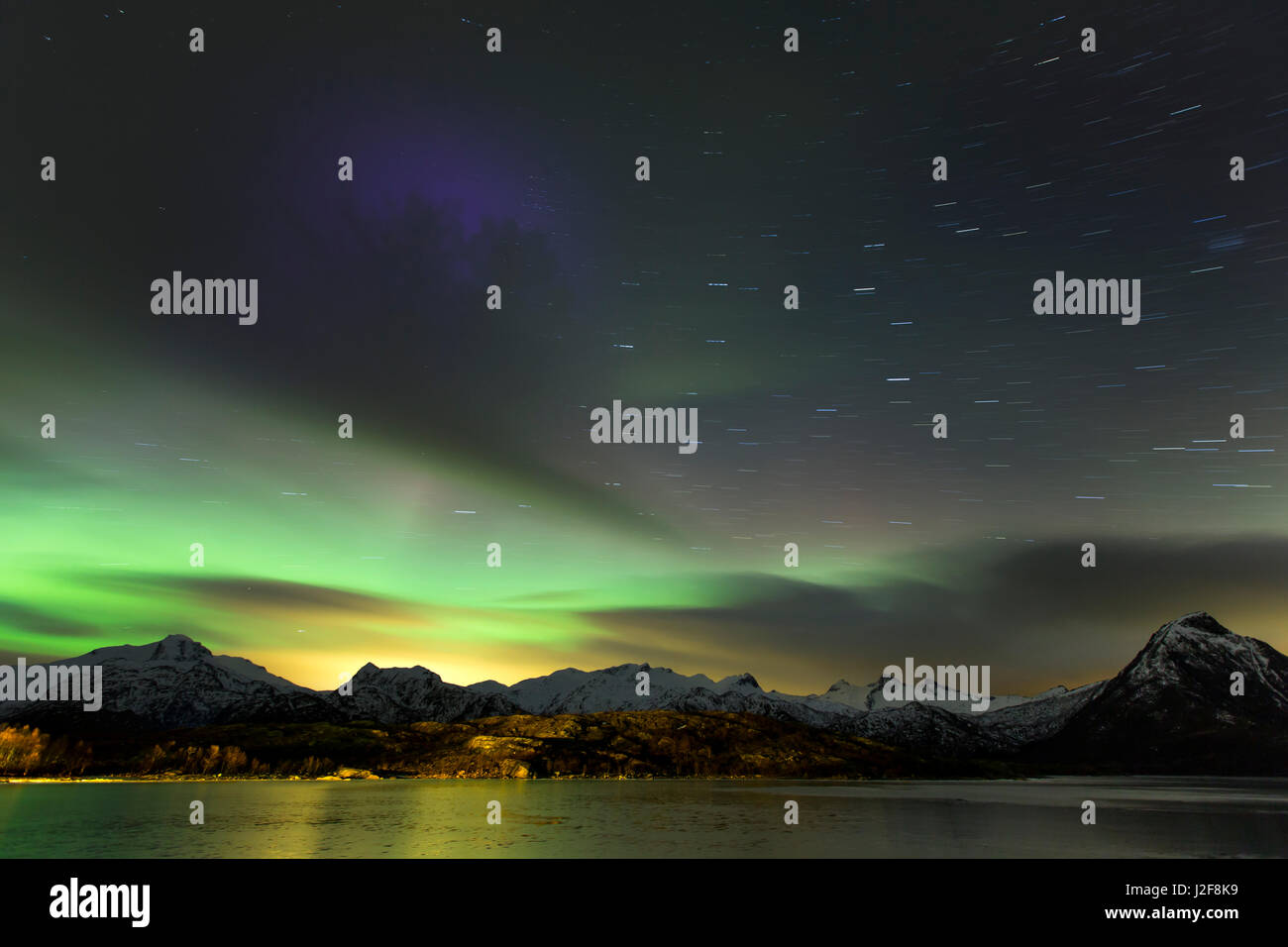 Northern lights (Aurora borealis) above a Norwegian Fjord Stock Photo ...