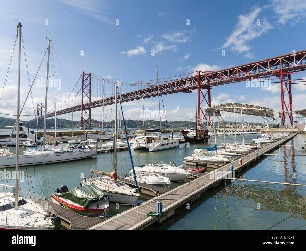 Marina at the Bridge Ponte 25 de Abril crossing river Tagus (Tejo ...