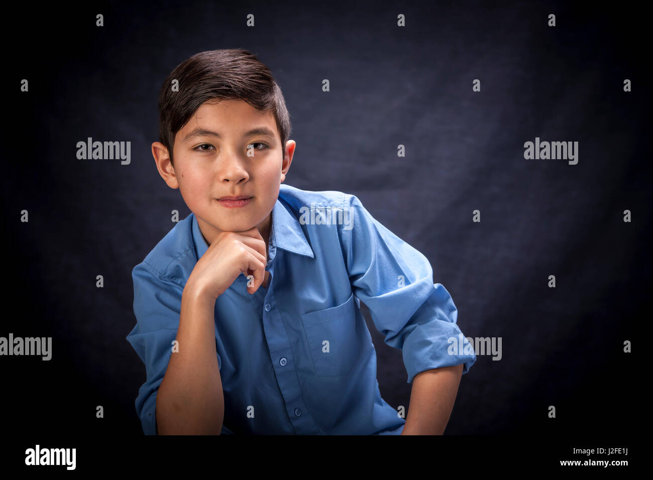 An expression portrait of a young boy conveying emotion Stock Photo - Alamy