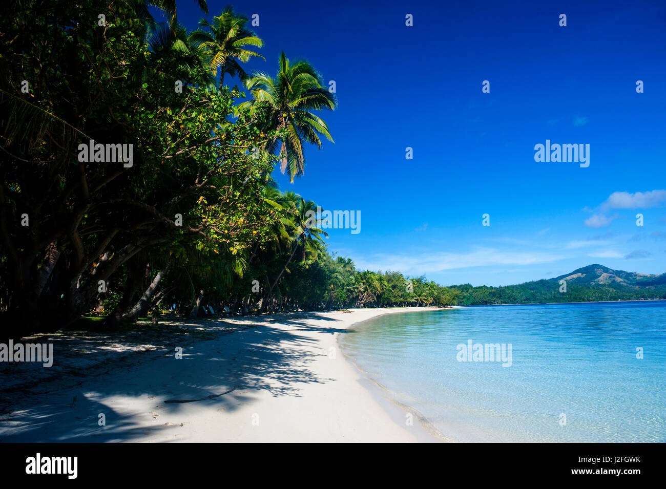 White sand beach and turquoise water at the Nanuya Lailai island, the ...