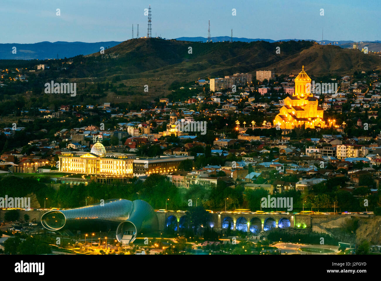 Night view of center Tbilisi city. Cityscape with evening illumination ...