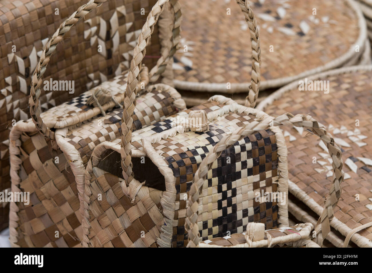 Kingdom of Tonga, Vava'u Islands, Neiafu. Hand woven palm souvenir bags ...