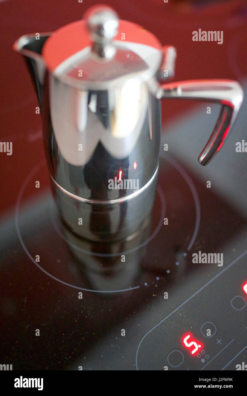Domestic views in the kitchen, induction stove and Italian style coffee ...