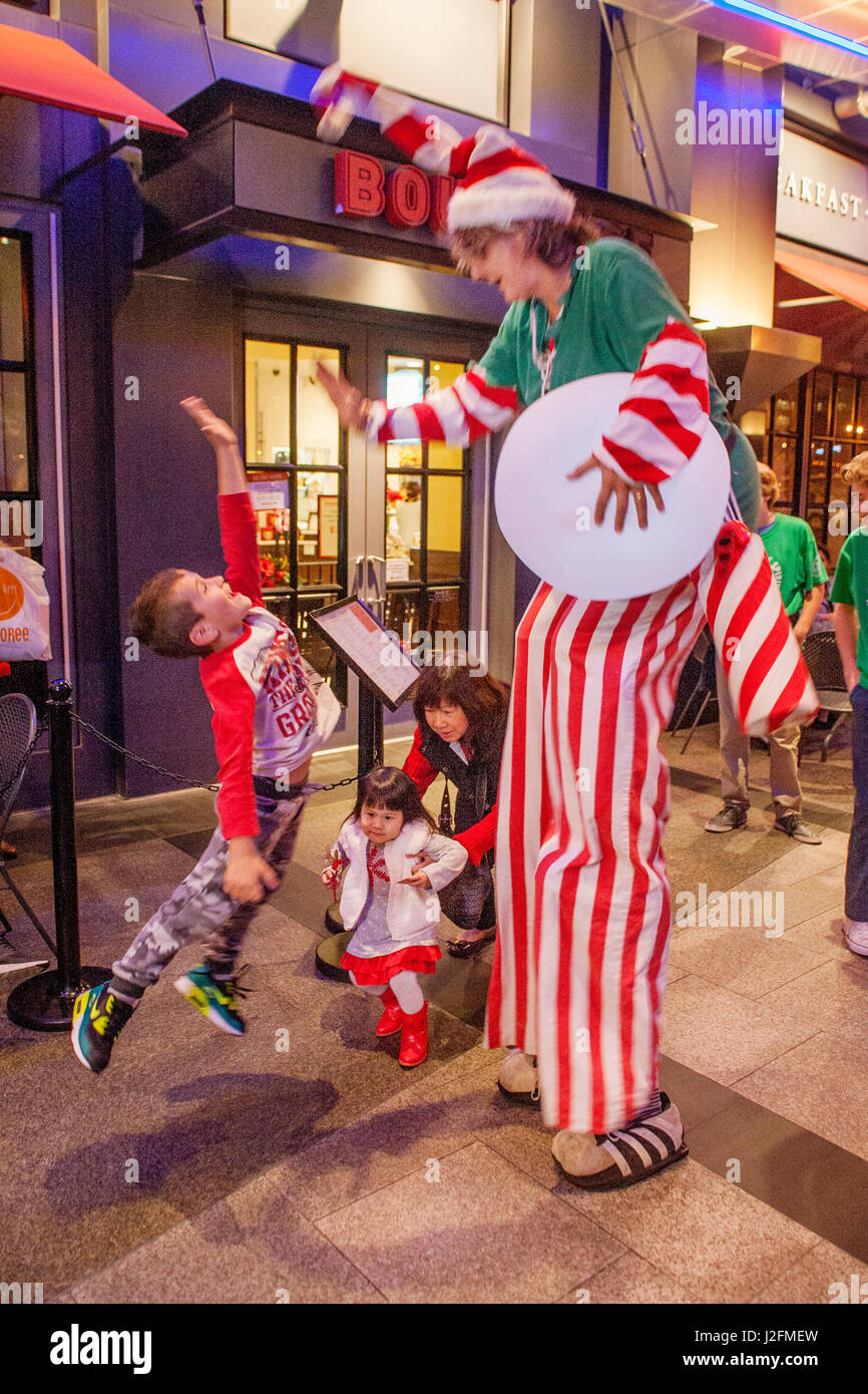 Clowns on stilts hi-res stock photography and images - Alamy