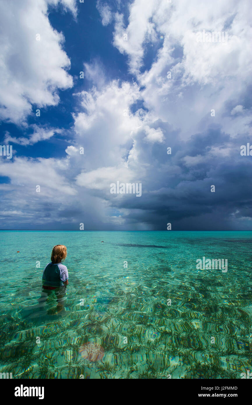 Tourist in the incredible blue waters of the Ant Atoll, Pohnpei ...