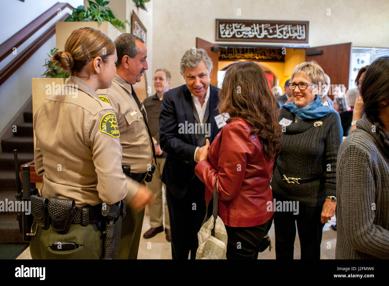 Uniformed Muslim police personnel arrive at a Mission Viejo, CA, mosque ...