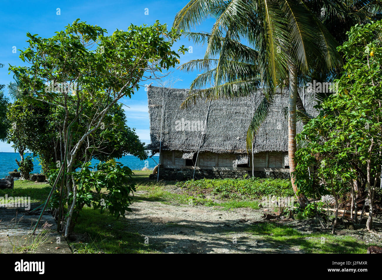 Traditional thatched roof hut, Island of Yap, Micronesia Stock Photo ...