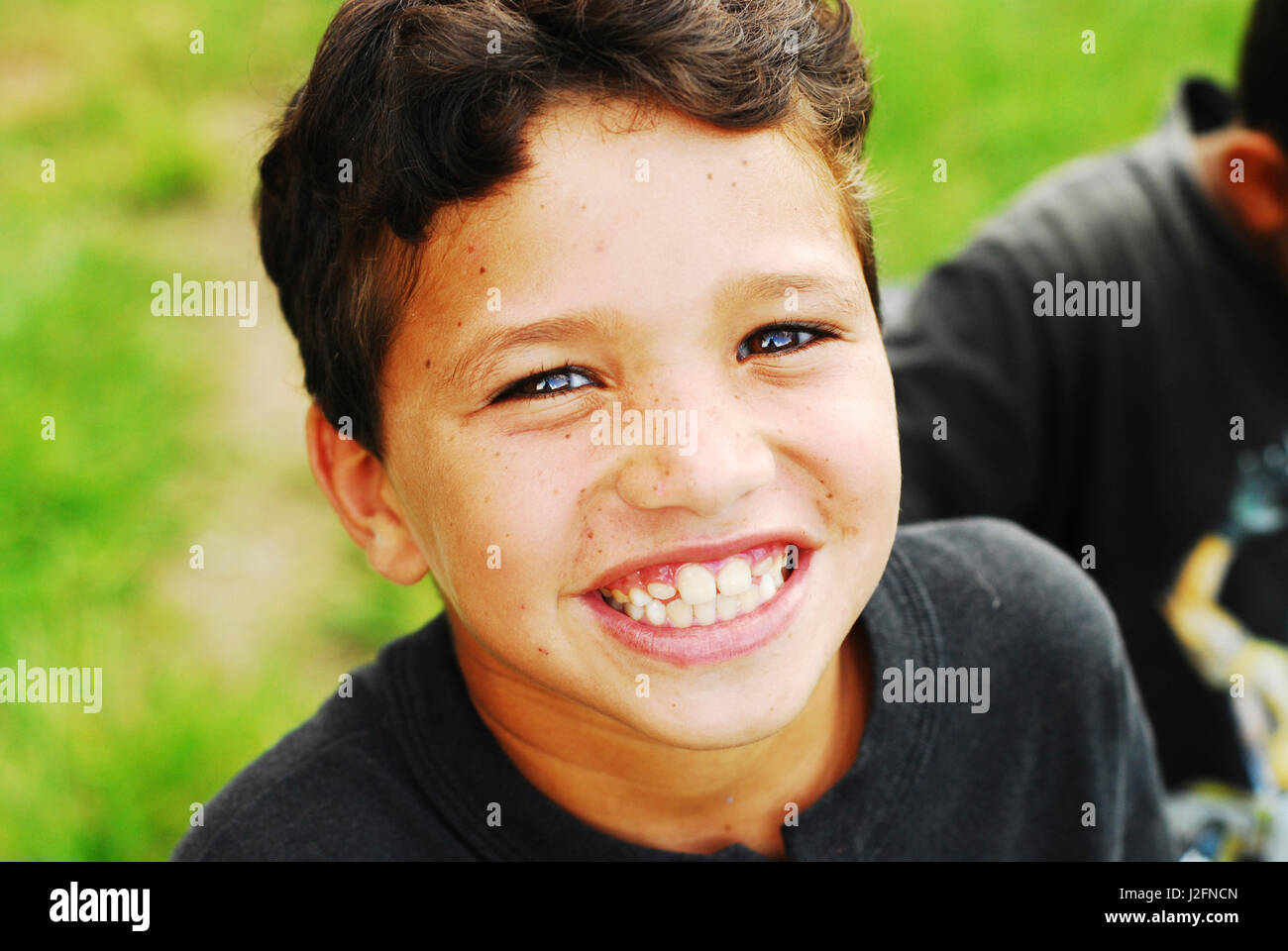 Belize, El Progreso, portrait of smiling boy at school Stock Photo - Alamy
