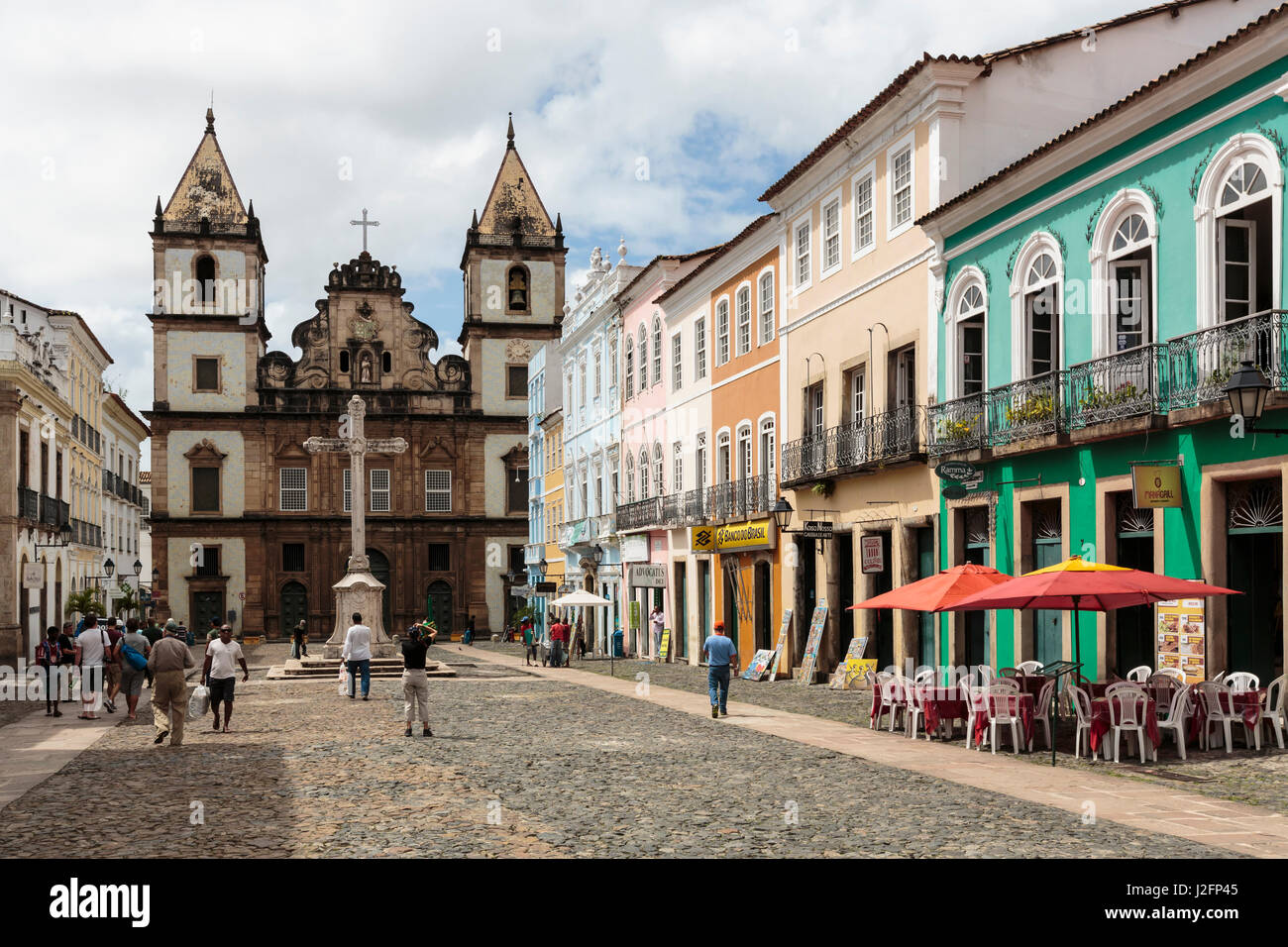 South America, Brazil, Salvador. Tourists walking through town square ...