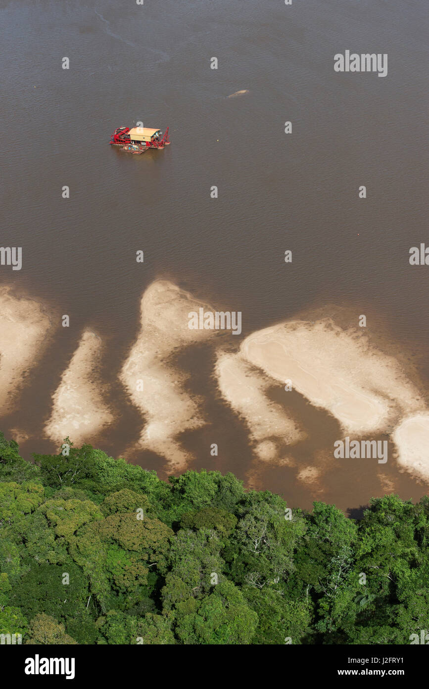 Gold Dredger. Essequibo River, Guyana. Longest river in Guyana Stock ...