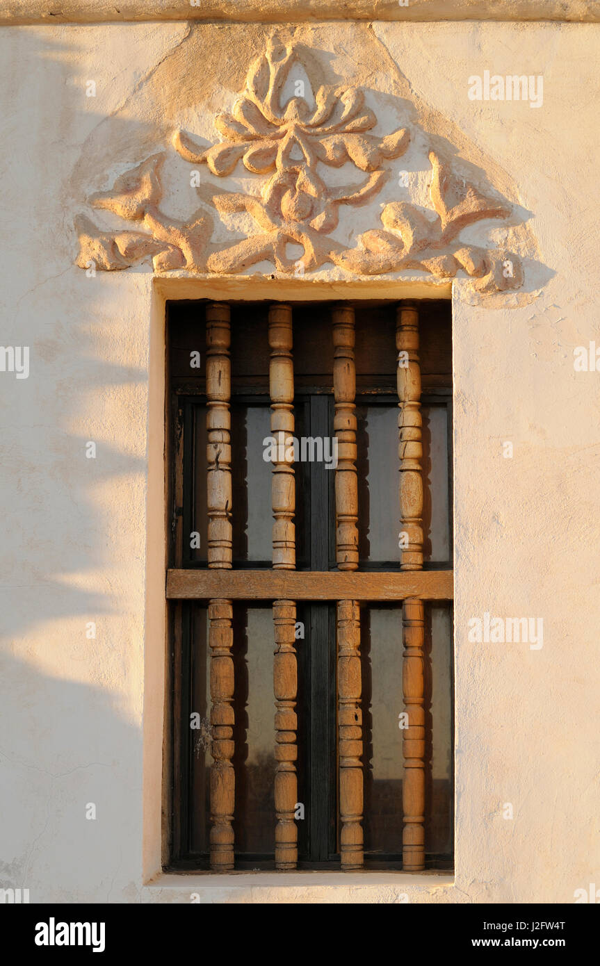 USA, Arizona, Tucson. Window with wooden bars and plaster carving, San ...