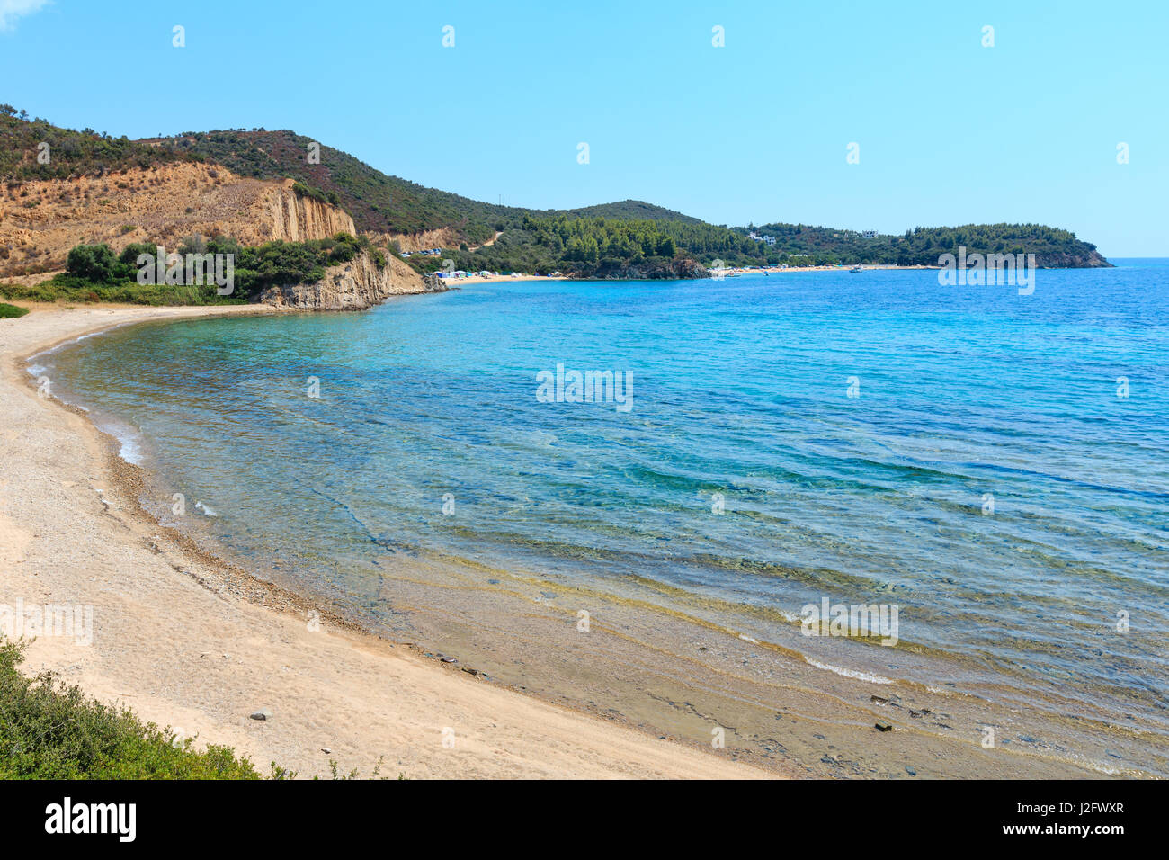 Summer Aegean Sea coast landscape with sandy beach and wild camping ...