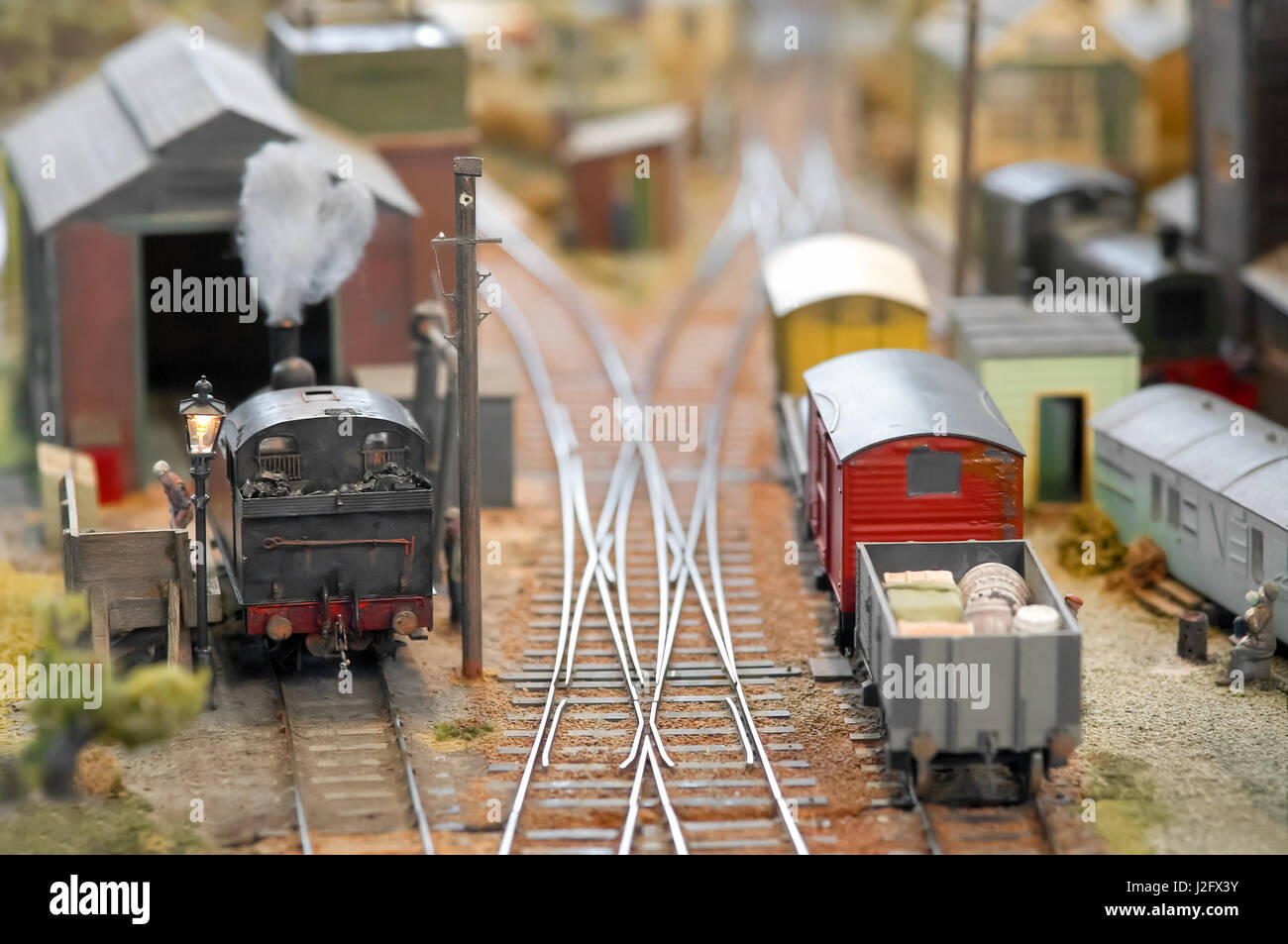miniature model trains in a freight yard Stock Photo - Alamy