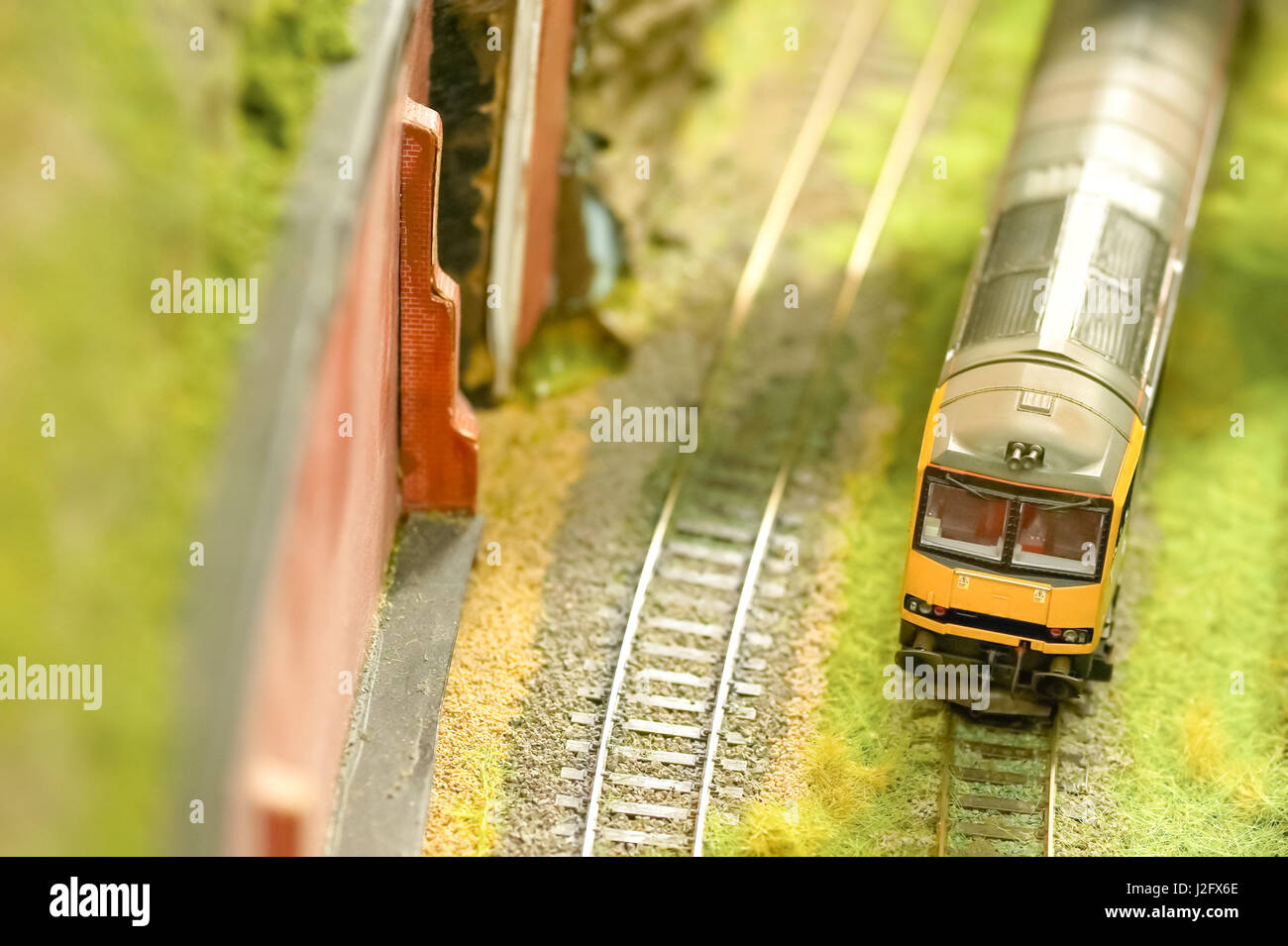 miniature express train on a model railroad set Stock Photo - Alamy