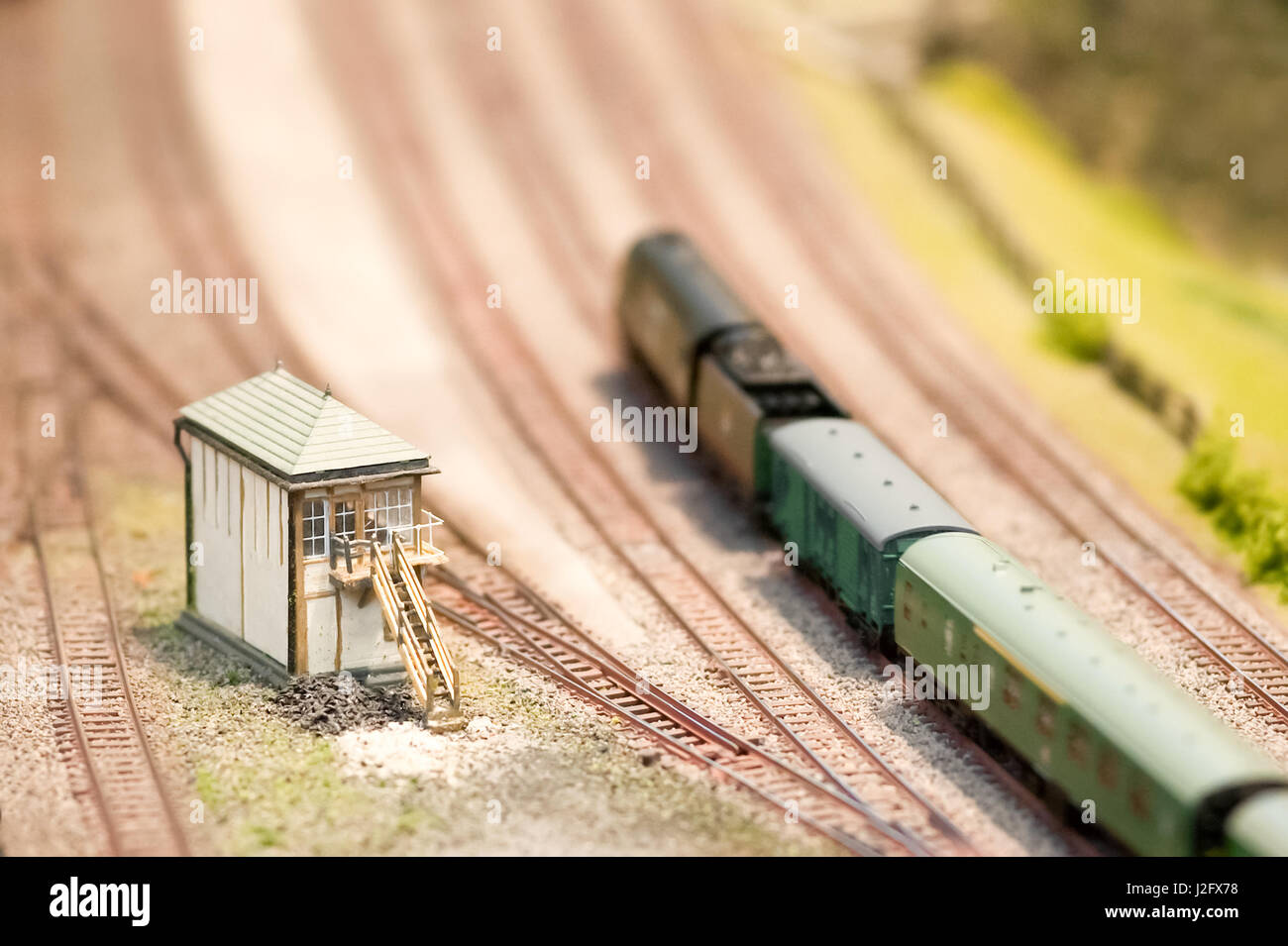 signal box and locomotive on a miniature model train set - shallow d.o ...