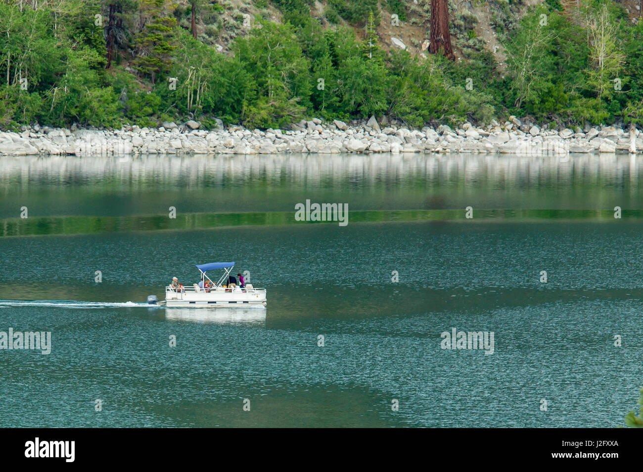 Pontoon Boat cruising on June Lake California Stock Photo - Alamy