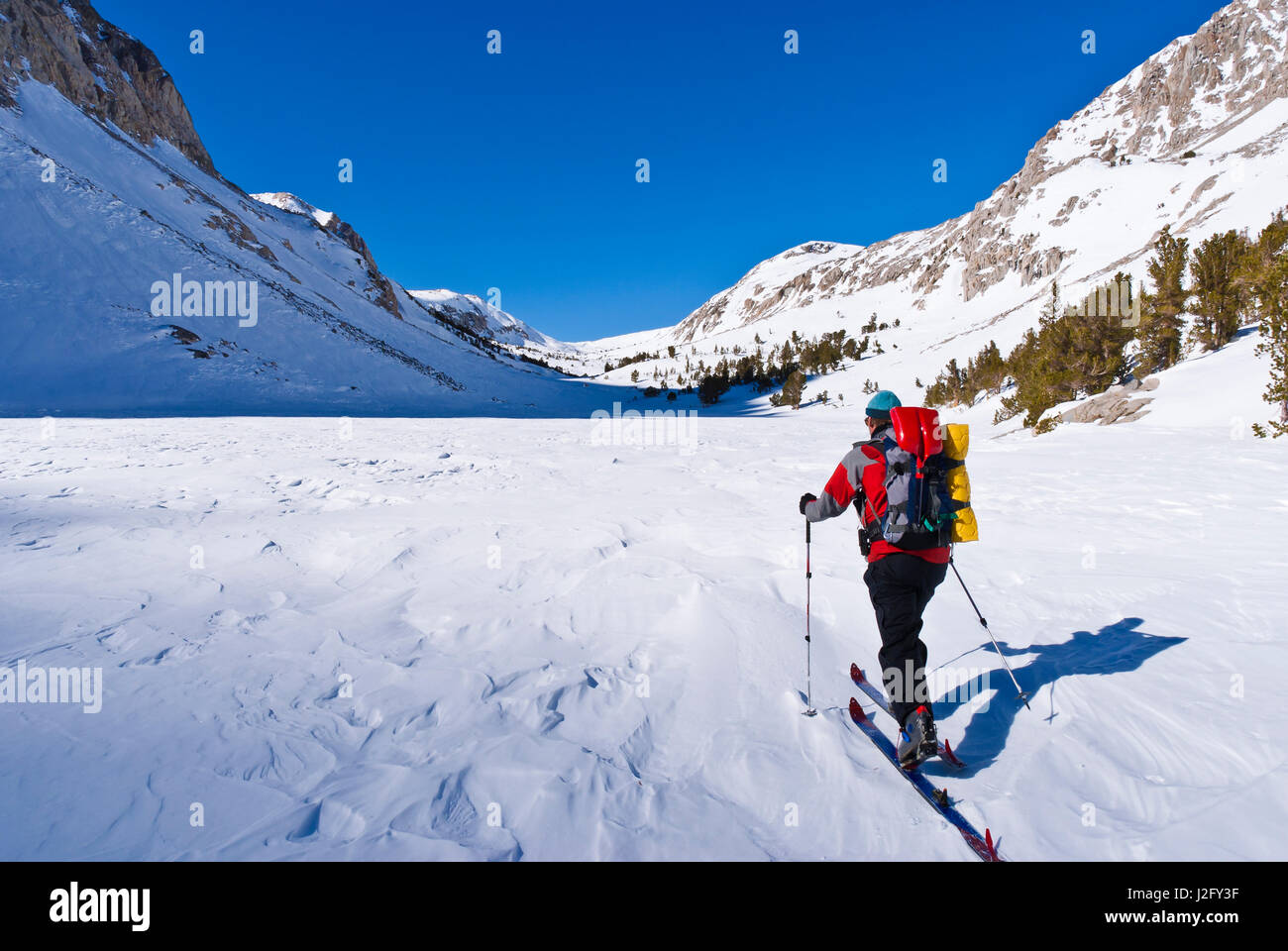 Backcountry skier crossing Loch Leven under Piute Pass, John Muir ...