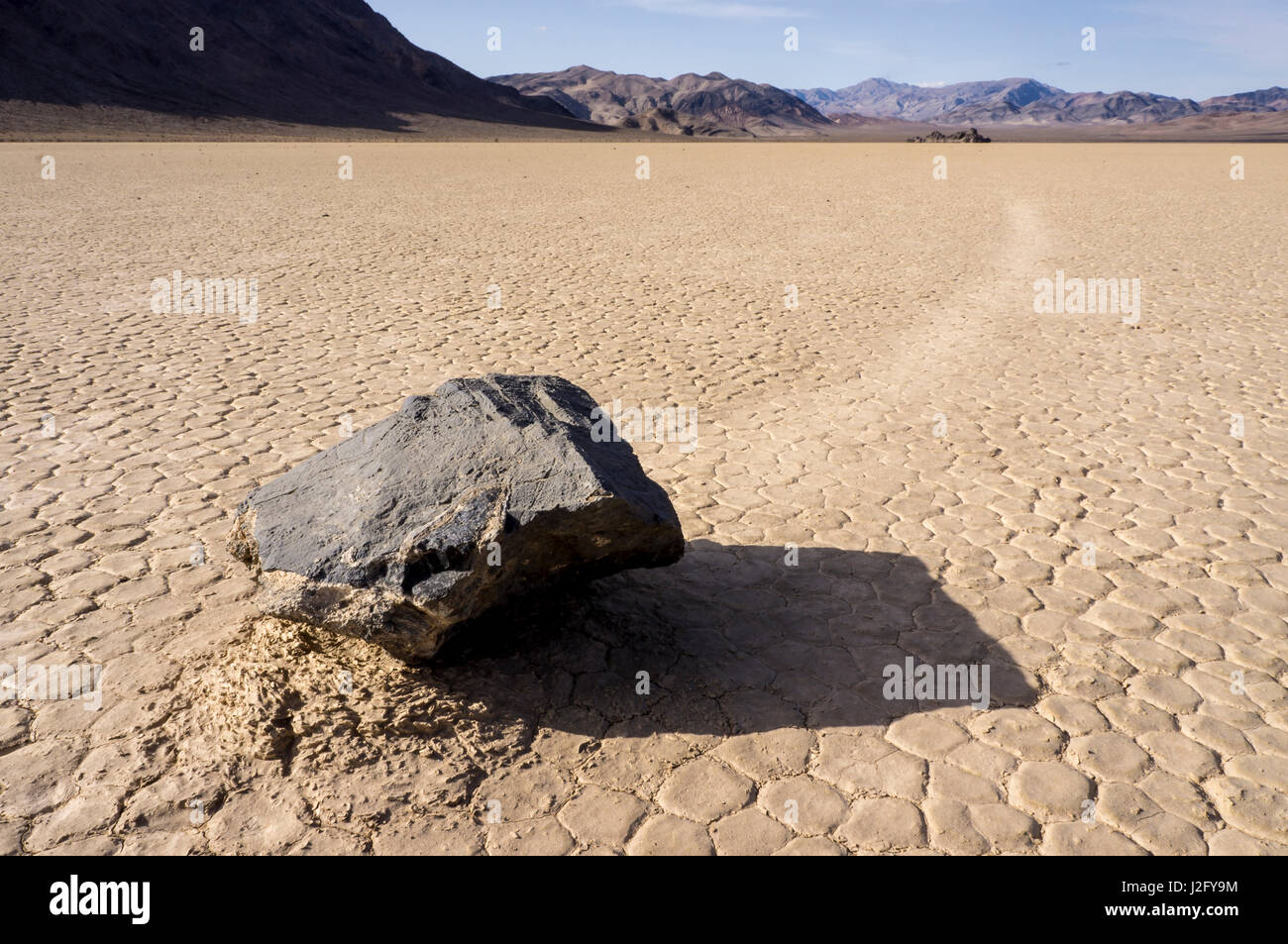 Moving rock at The Racetrack dry lake, Death Valley National Park ...