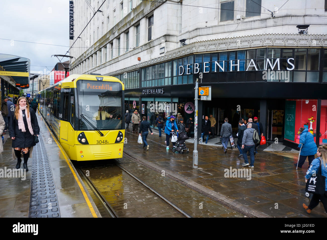 Metrolink light rail transit tram at tram stop in Market Street ...