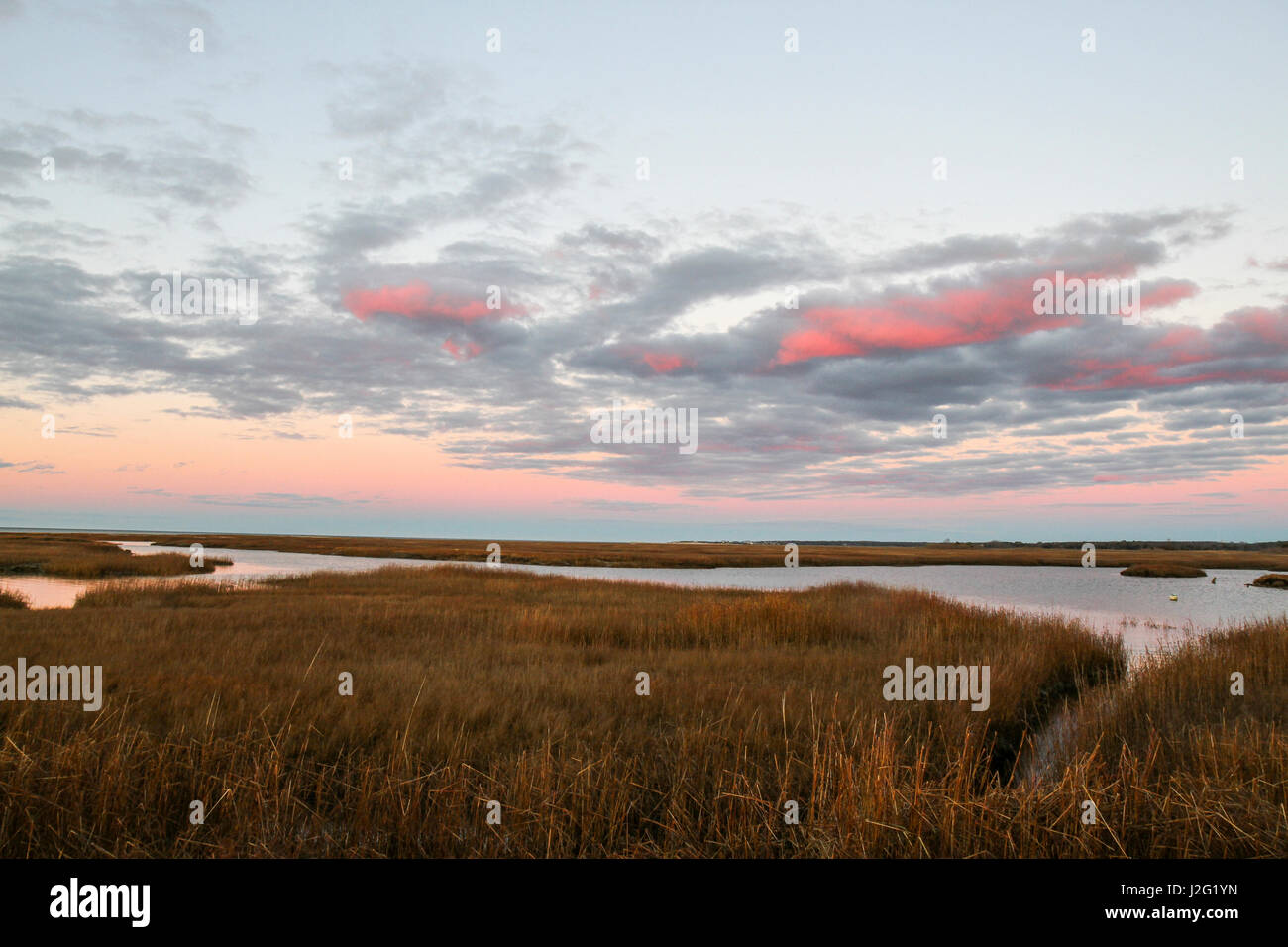 Winter view of sunset over wetlands on Cape Cod, Massachusetts, USA ...