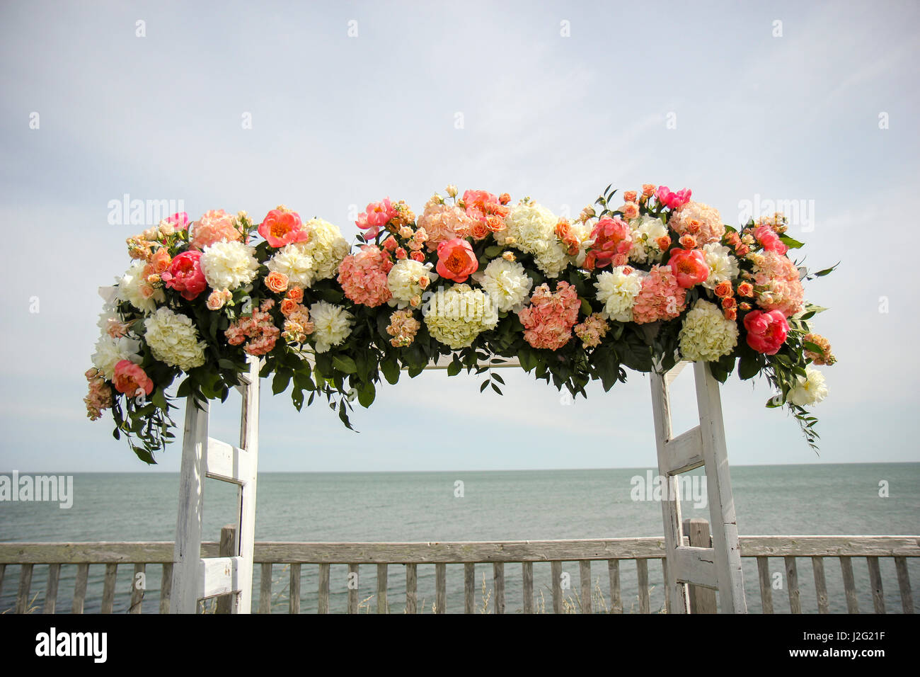 Trellis by the ocean at a wedding ceremony at Pelham House Resort ...
