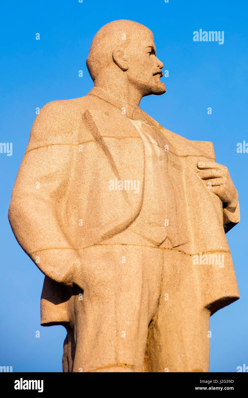 A Statue Of Lenin. Lenin monument in clear blue sky Stock Photo - Alamy
