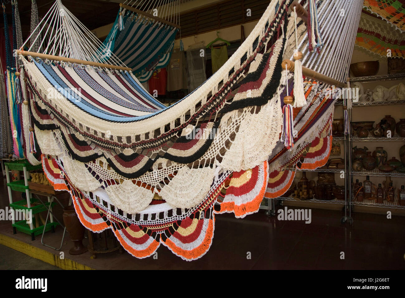 Central America, Nicaragua, Masaya. Woven hammocks on display at shop ...