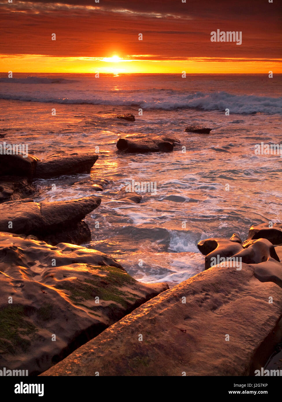 USA, California, La Jolla. Sunset over tide pools at Coast Blvd. Park ...