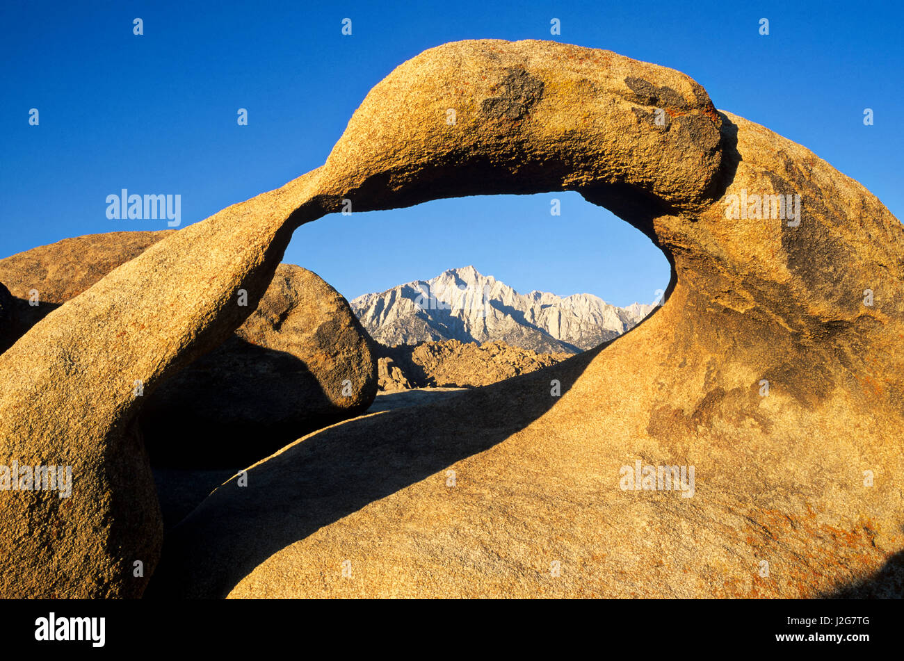 USA, California, Eastern Sierra, Lone Pine Peak through the Mobius arch in the Alabama Hills ...