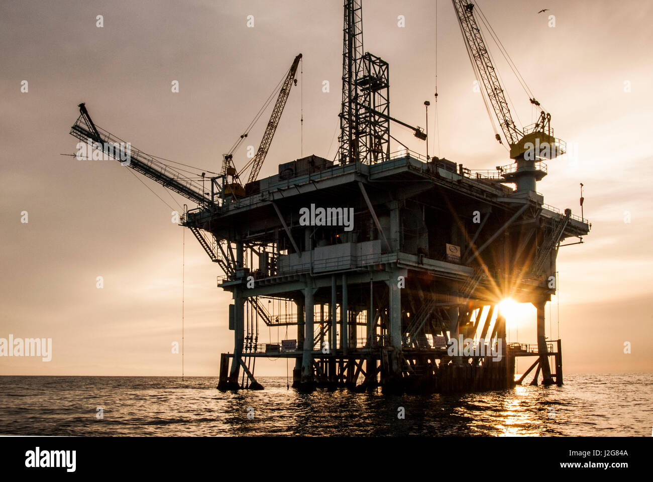 USA, California, Santa Barbara Channel, Platform C oil rig, silhouette ...