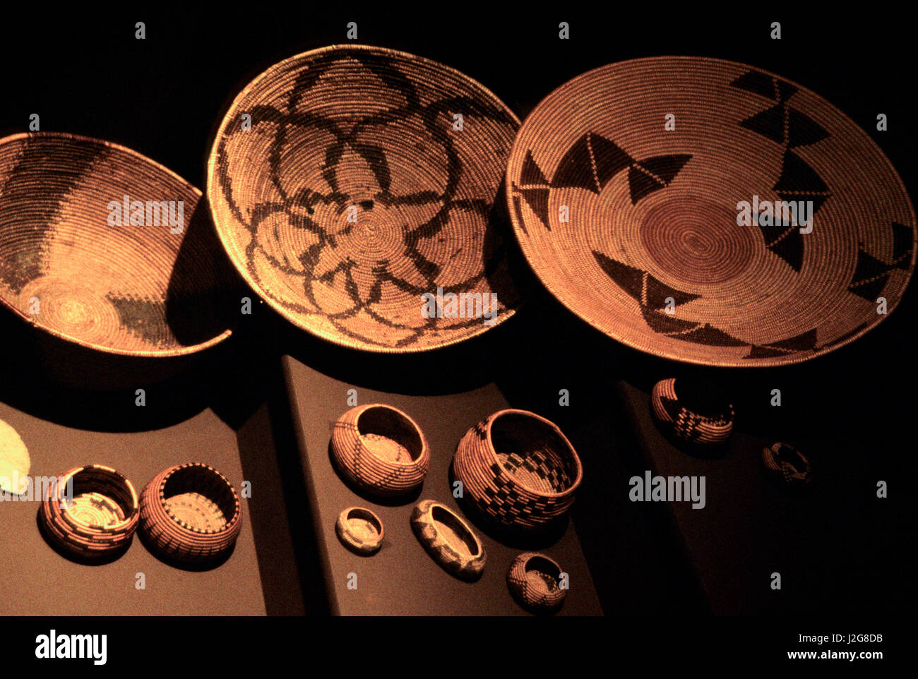 A variety of sizes and shapes of Pomo Indian baskets that are hand ...